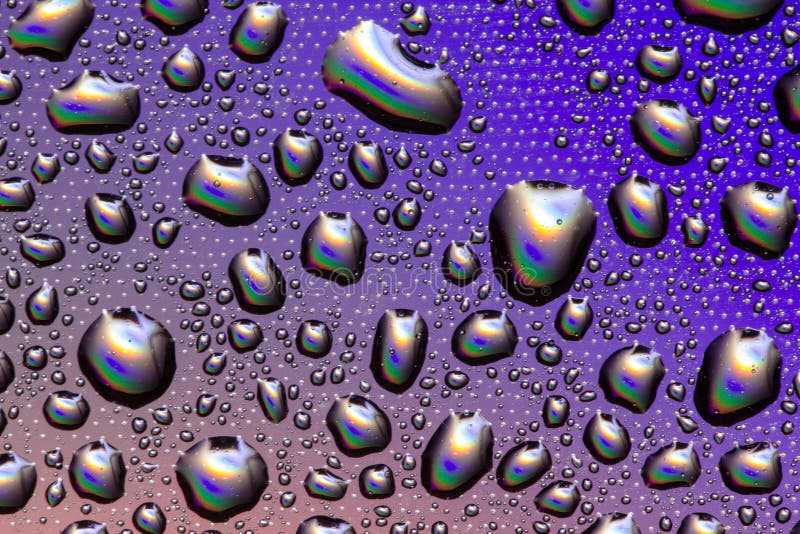 Drops of Water on the Glass, with the Reflection of the Rainbow Stock ...