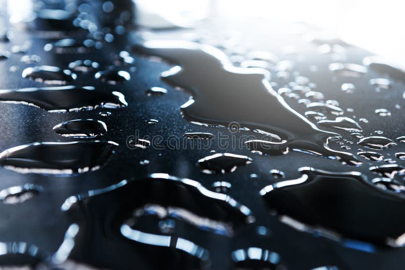 Drops of water has spread stock photo. Image of rain - 104462118