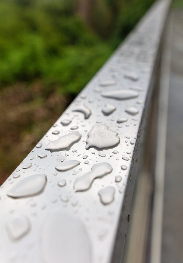 Drops of Water from Rain on a Metal Railing Stock Image - Image of ...