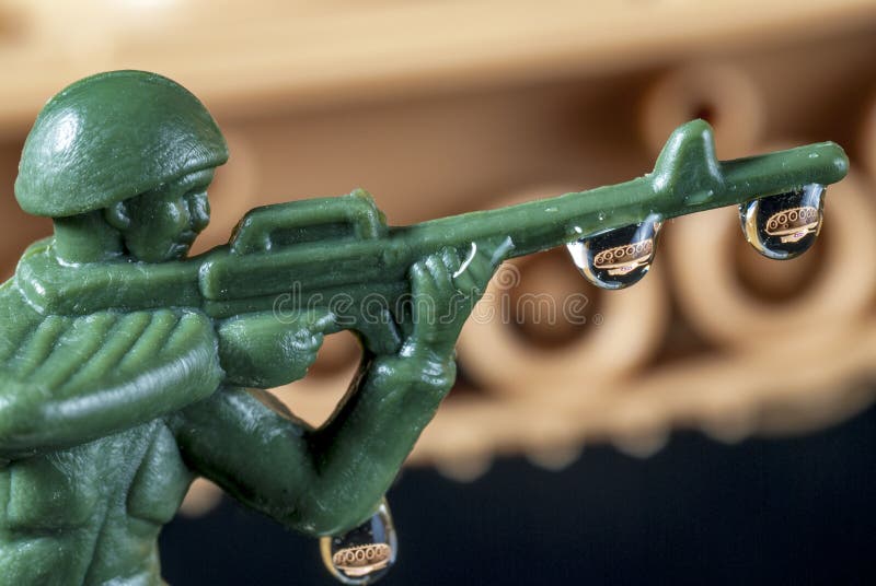Plastic Army Man with Drops and Tank Reflection Stock Image - Image of ...