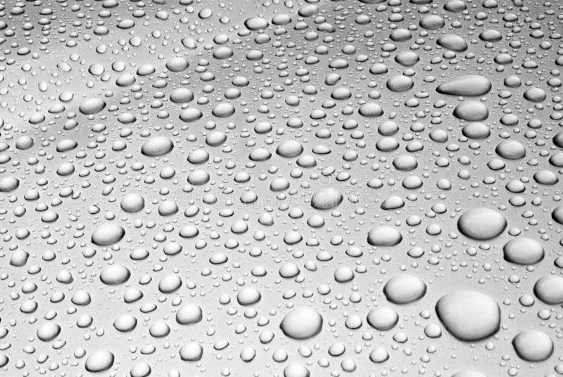Drops of of Water on Silver Stock Image - Image of cracked, flower ...