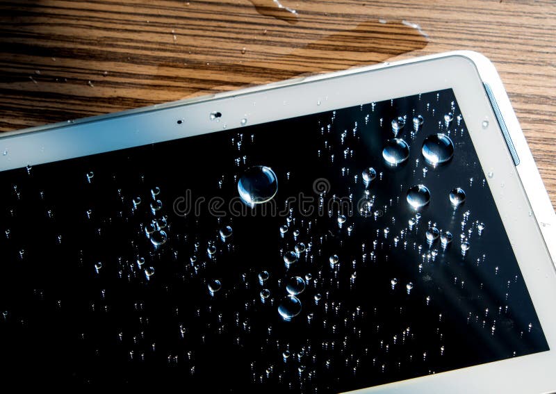 Drops of Water on Tablet Screen Stock Photo - Image of shadow, water ...