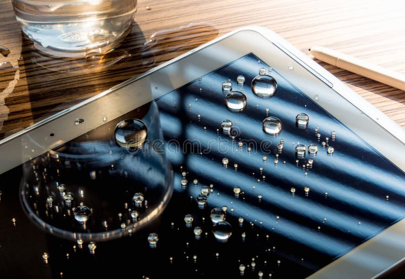 Drops of Water on Tablet Screen Stock Photo - Image of technology ...