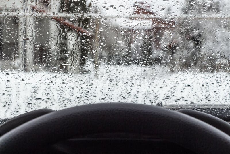 Drops on the windshield stock photo. Image of snowfall - 245394346