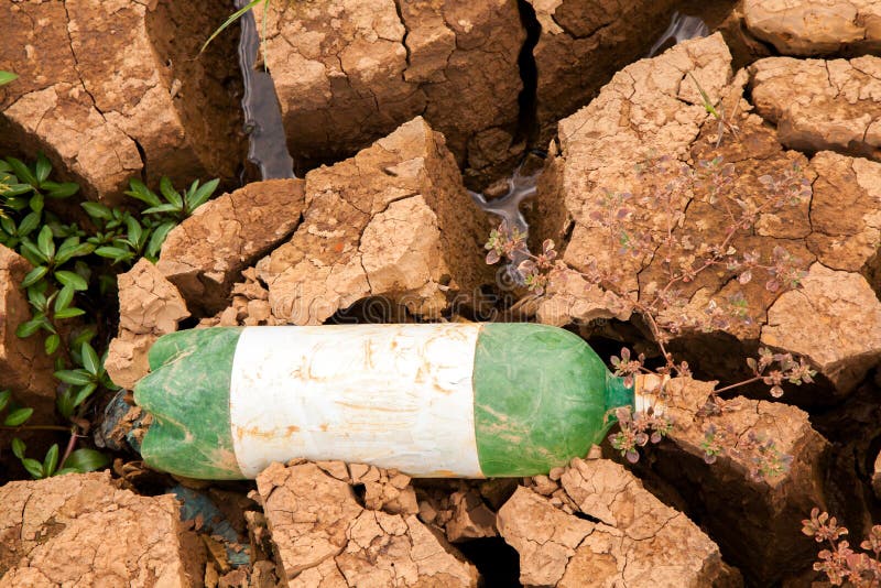 Drought soil with garbage stock photo. Image of braganca - 93073384
