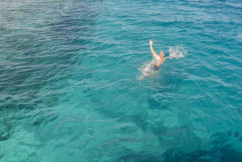 Drowning Man in Sea Asking for Help with Raised Arms. the Man is ...