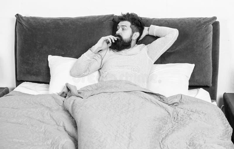 Drowsy Man Being in Bed Awake after Sleep, Morning Stock Photo - Image ...