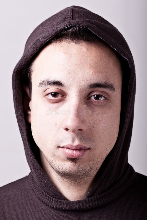 The young guy in a hood stock photo. Image of clothing - 12867082