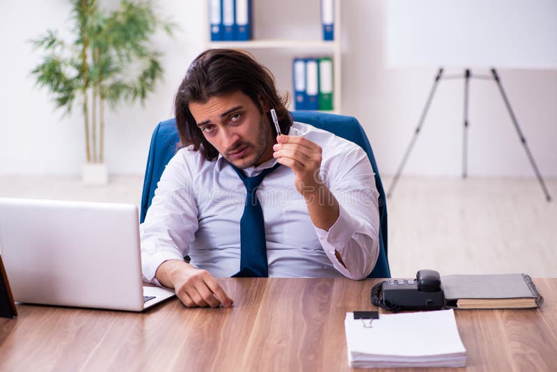 Drug Addicted Male Employee Working in the Office Stock Photo - Image ...