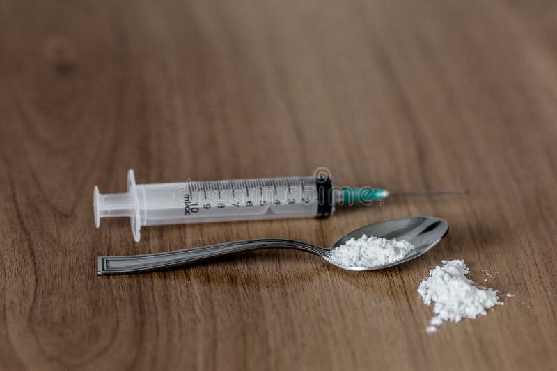 Drug Syringe and Cooked Heroin on Spoon Stock Image - Image of hospital ...