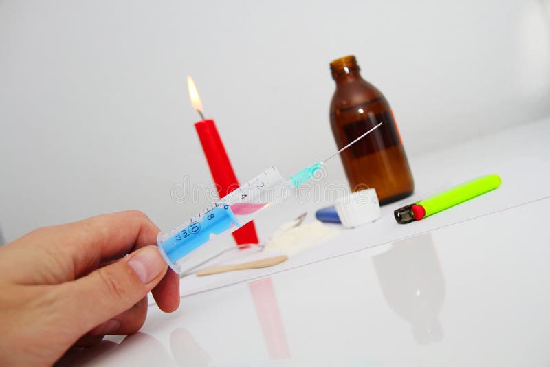Drug Syringe and Cooked Heroin on Spoon Stock Photo - Image of junk ...