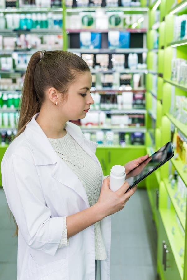 Druggist Looking for Some Medications in Pharmacy Stock Image - Image ...