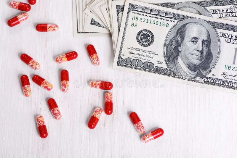 Drugs and money on a desk stock image. Image of medicine - 77298221