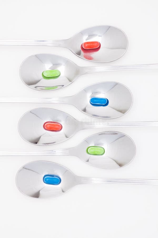 Drugs pills on the spoon stock image. Image of pharmaceutical - 31795927