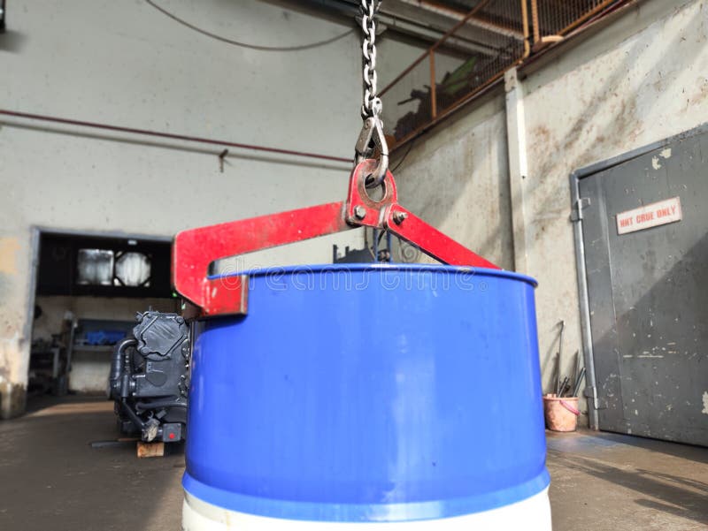 A Drum Lifter Tool and Remote Overhead Crane Editorial Photography ...