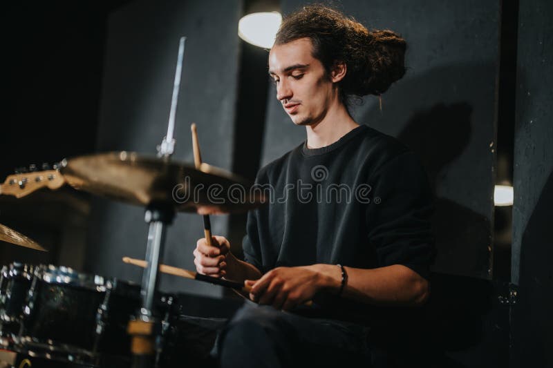 Young Musician Playing Drums during Band Rehearsal Session Stock Image ...