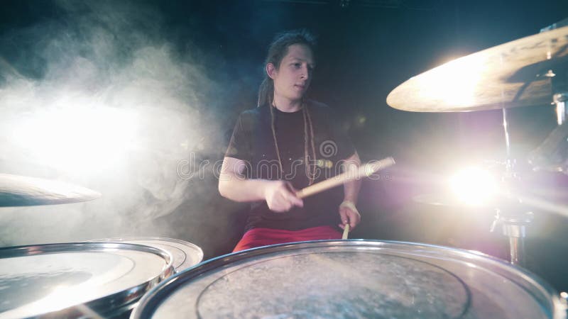 Drummer Hitting on Wet Drum Cymbal, and the Water Splashing from Cymbal ...