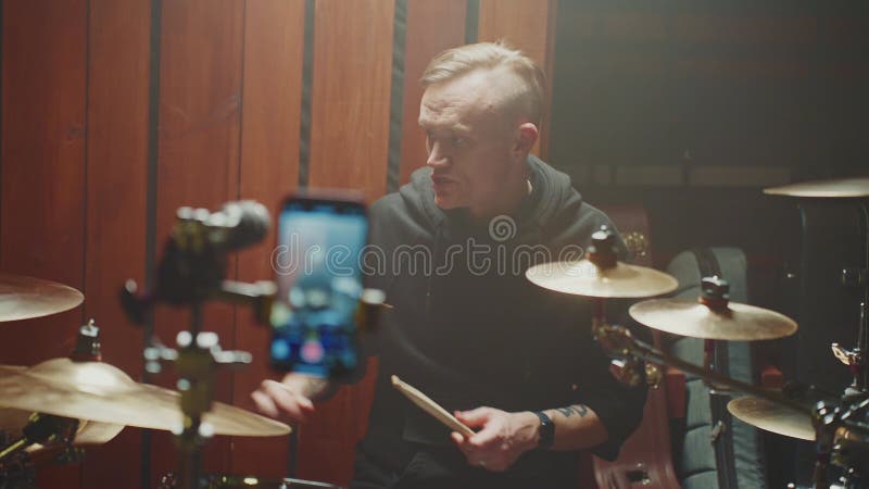 Drummer Performs in a Recording Studio with Focus on Technique and ...