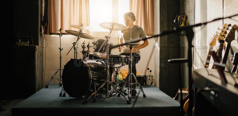 Drummer Practicing in Music Studio Stock Image - Image of drummer ...