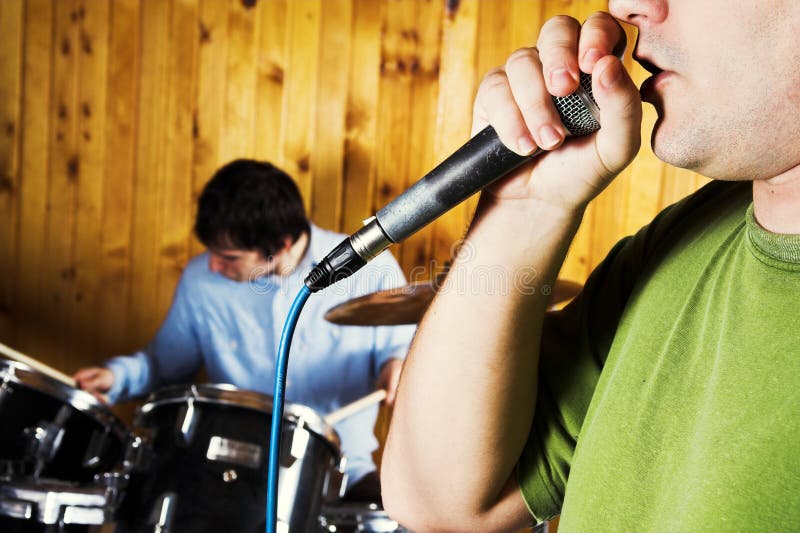 Drummer and rock singer stock image. Image of player, electric - 2212639