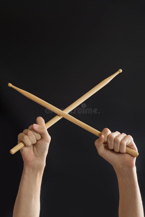 Drumsticks in Hands on a Black Background Stock Image - Image of stage ...