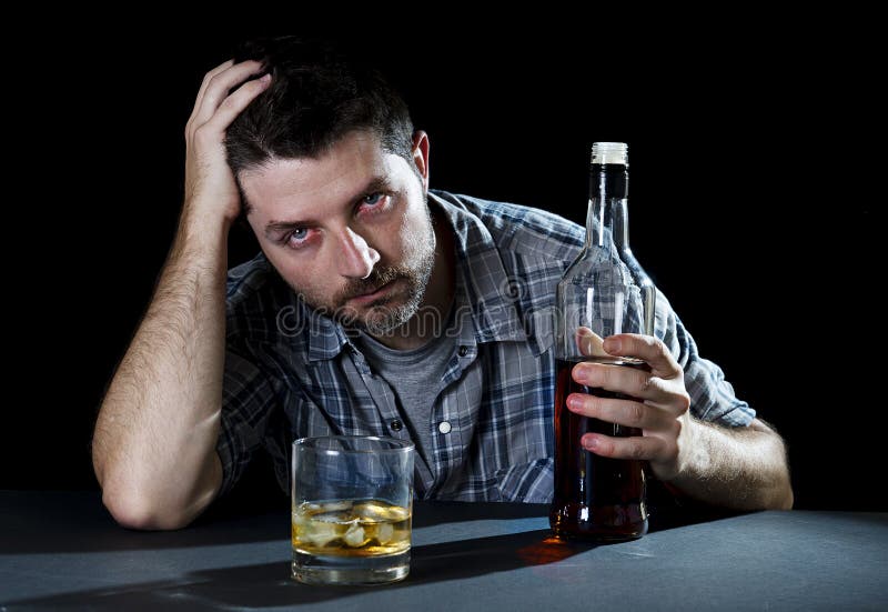 Drunk Alcoholic Man With Whiskey Glass And Bottle In Alcohol Addiction