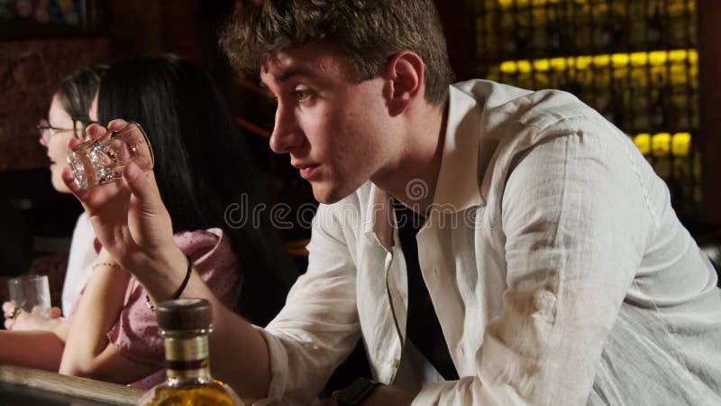 Drunk Depressive Guy Sits with Empty Glass at Bar Counter Stock Image ...