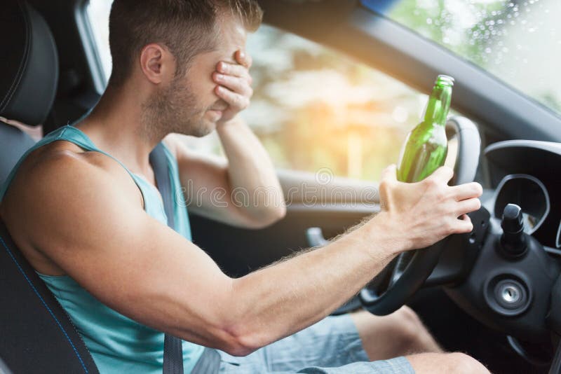 Drunk Driver Behind the Steering Wheel of a Car Stock Photo - Image of ...