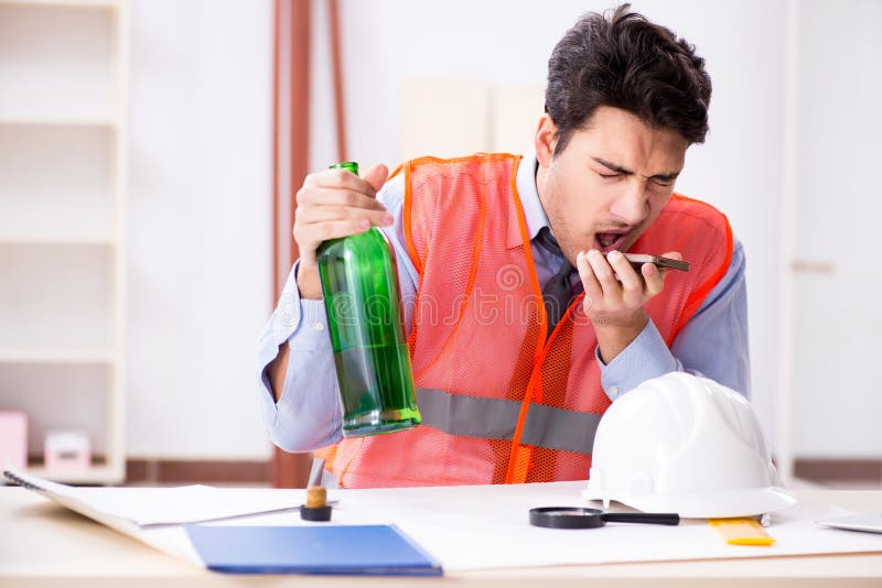 The Drunk Engineer Working in the Workshop Stock Photo - Image of ...