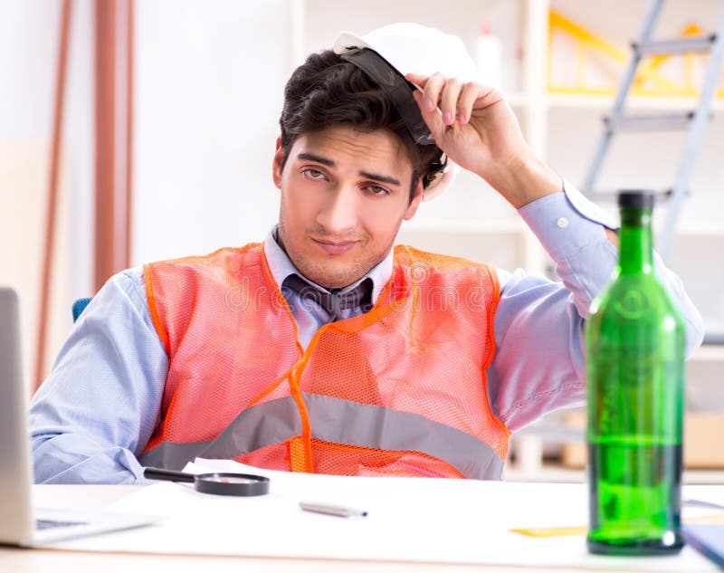Drunk Engineer Working in the Workshop Stock Photo - Image of ...