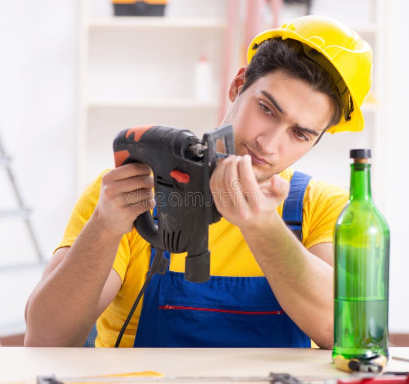 Drunk Engineer Working in the Workshop Stock Image - Image of ...