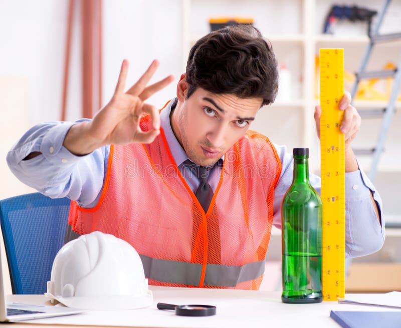 Drunk Engineer Working in the Workshop Stock Image - Image of booze ...