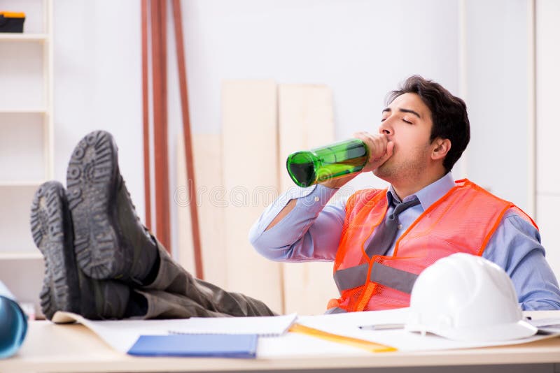 The Drunk Engineer Working in the Workshop Stock Photo - Image of ...