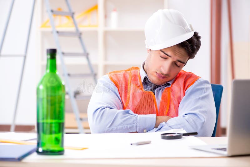 The Drunk Engineer Working in the Workshop Stock Photo - Image of ...