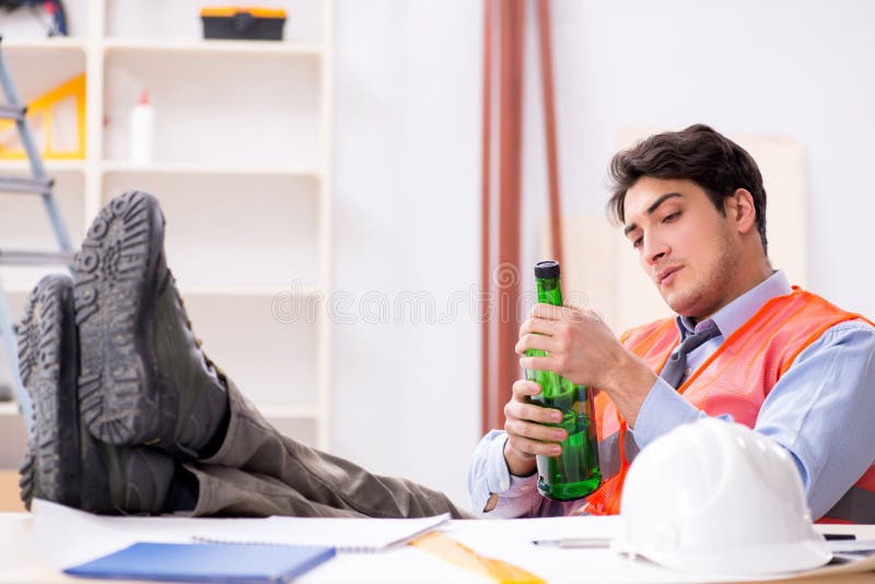 The Drunk Engineer Working in the Workshop Stock Photo - Image of ...
