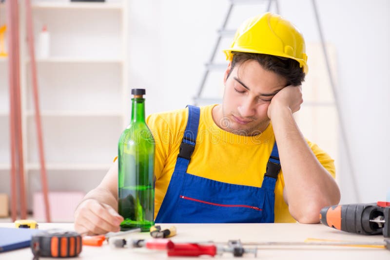 The Drunk Engineer Working in the Workshop Stock Image - Image of ...