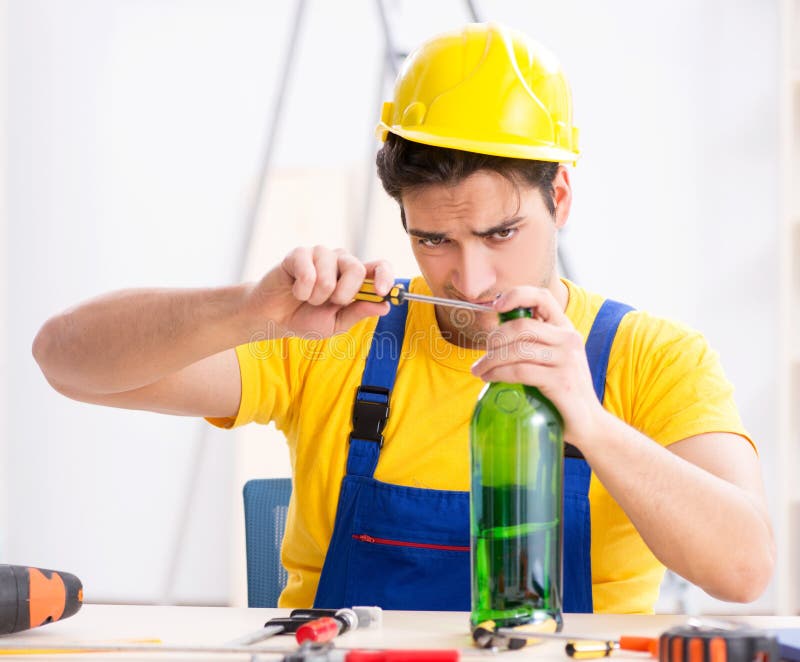 Drunk Engineer Working in the Workshop Stock Photo - Image of ...