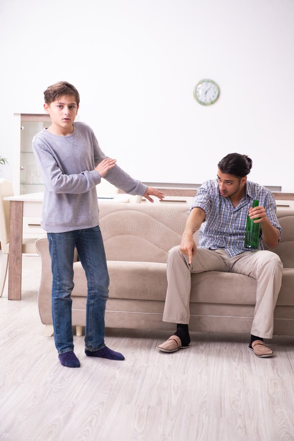 Drunk father and his son stock image. Image of domestic - 156824857