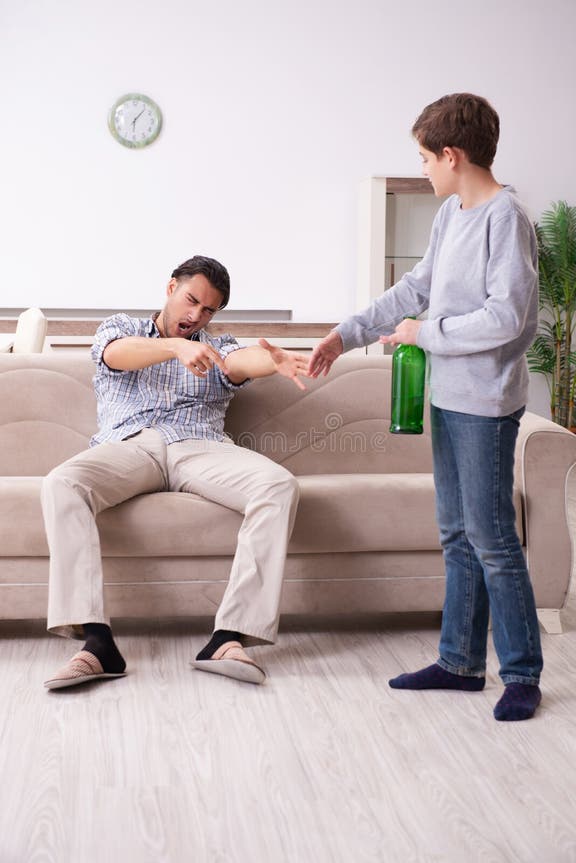 Drunk father and his son stock photo. Image of anger - 161739874