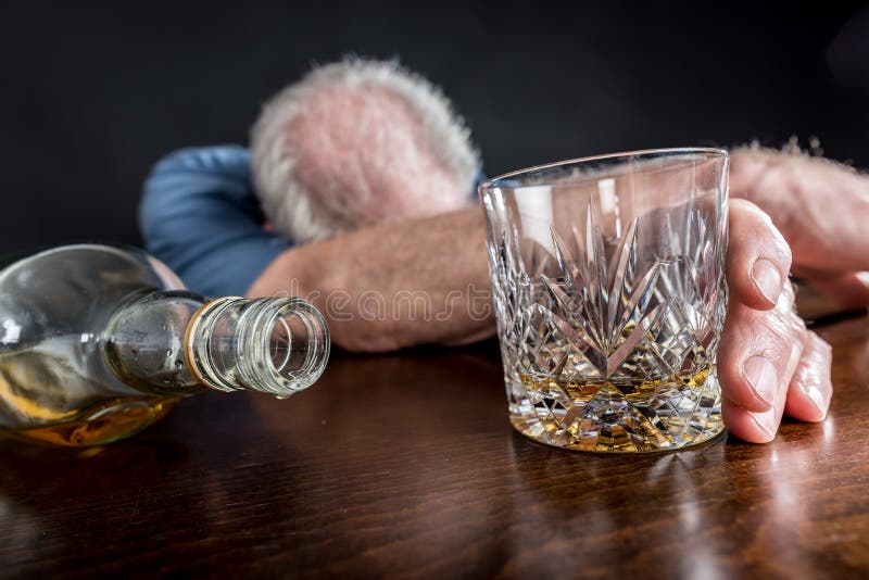 Drunk man slumped on table stock image. Image of alone - 66169789