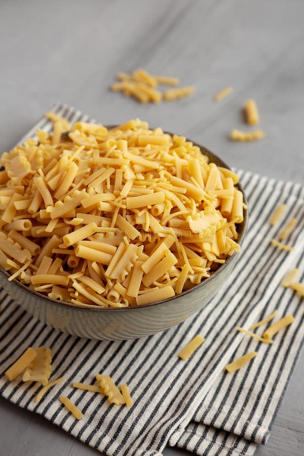 Dry Assorted Italian Pasta in a Bowl, Side View Stock Photo - Image of ...