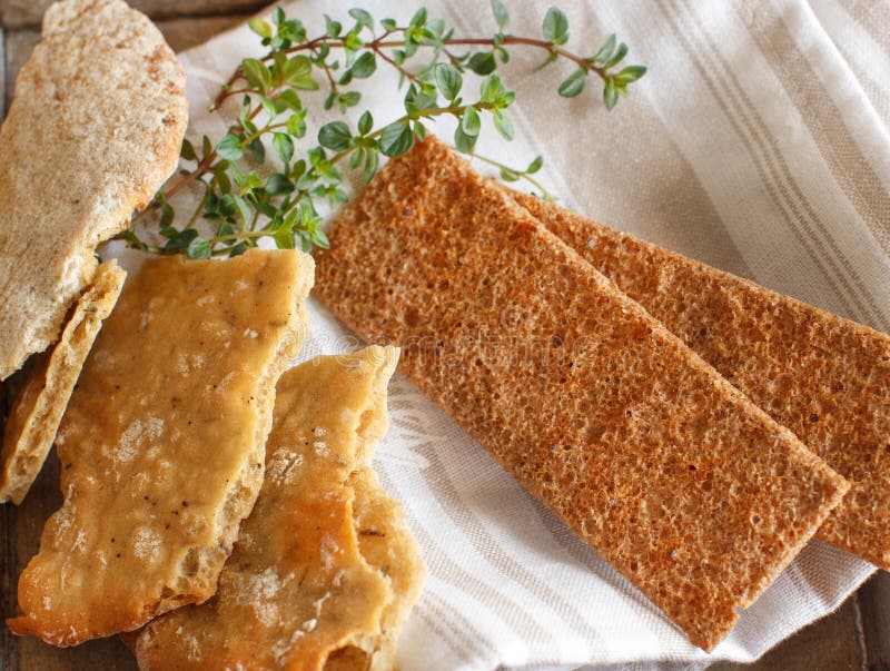Dry Bread with Herbs on Napkin and Wooden Tray Stock Image - Image of ...