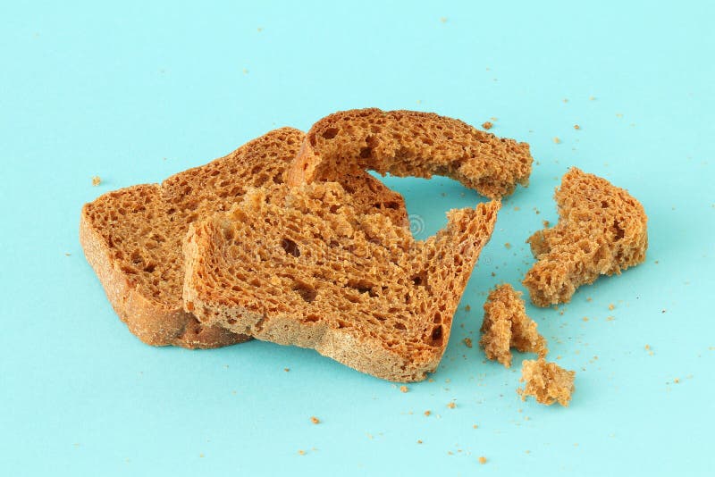 Dry Broken Bread on a Blue Background. Stock Image - Image of flour ...