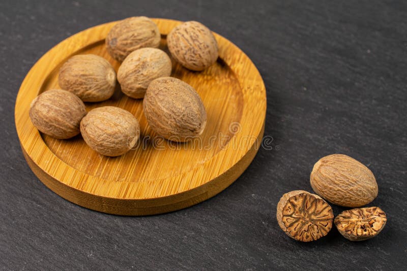 Dry Brown Nutmeg on Grey Wood Stock Image - Image of close, flavour ...