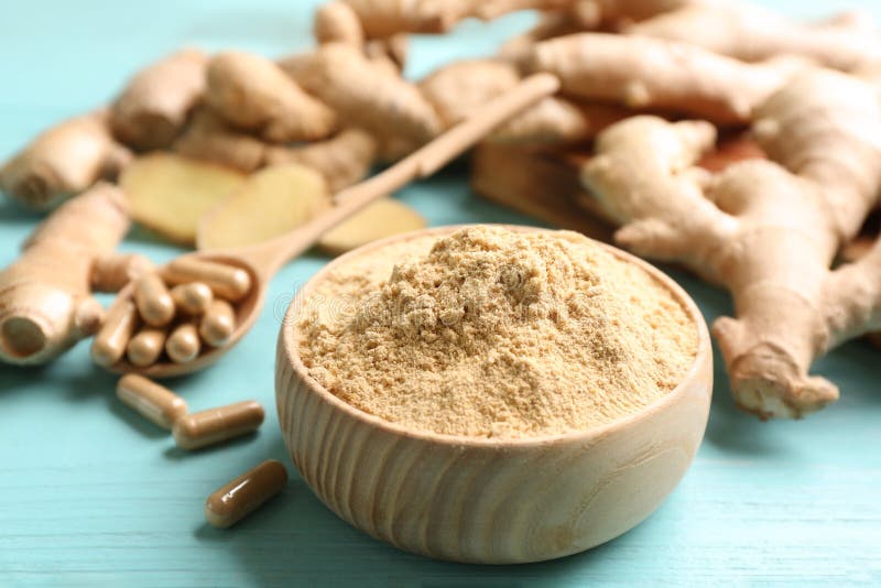 Dry, Capsuled and Fresh Ginger on Light Blue Wooden Table, Closeup ...