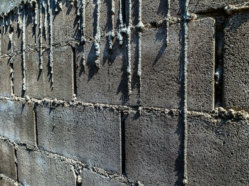 Dry Cement Drips on Bricks Wall. Mortar Dripping and Running Down the ...