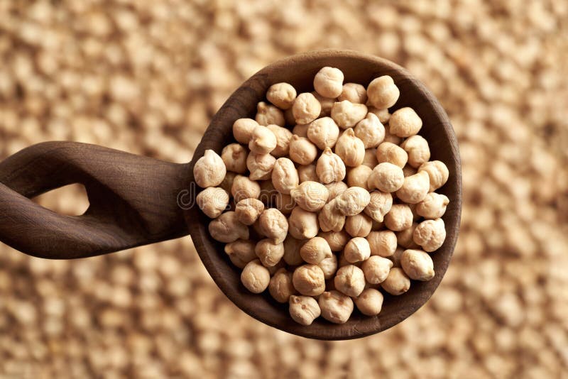 Dry Chickpeas on a Wooden Spoon Stock Photo - Image of chickpeas ...