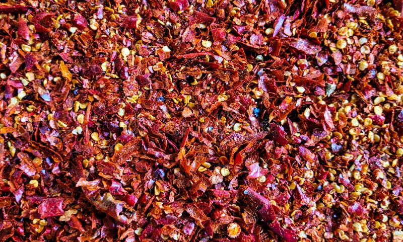 Dry chili flakes stock photo. Image of isolated, pepper - 259875418