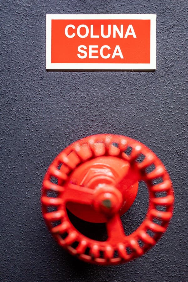 Dry Column, Red Tap on a Black Background in Great Contrast. Stock ...