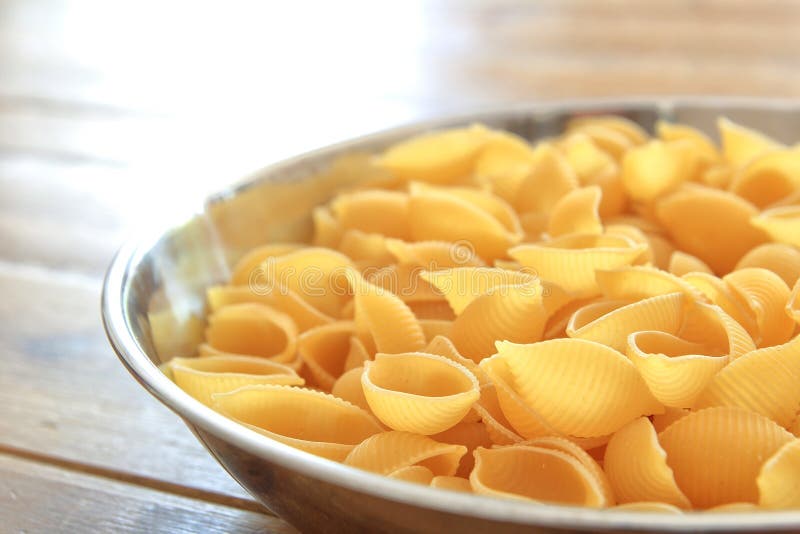 Dry Conchiglie Pasta Shells in a Stainless Steel Bowl Stock Image ...